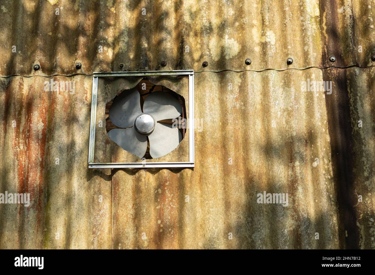 Old metal exhaust fan on an abandoned building Stock Photo - Alamy