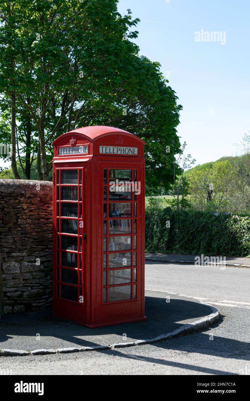 Telephone box converted into a library in the Cotswolds Stock Photo - Alamy