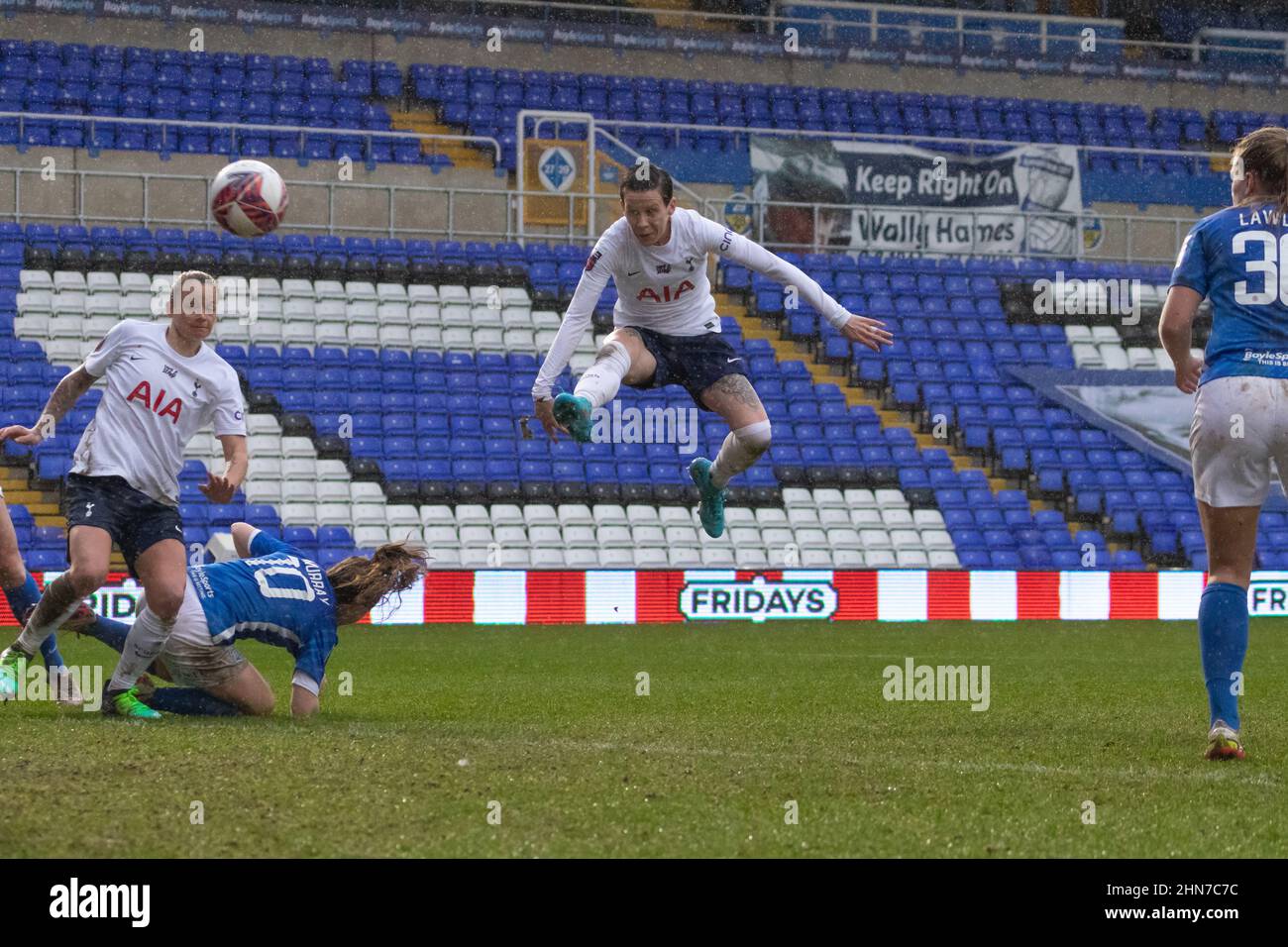 Ashleigh Neville of Tottenham Hotspur striking the ball at the crossbar ...