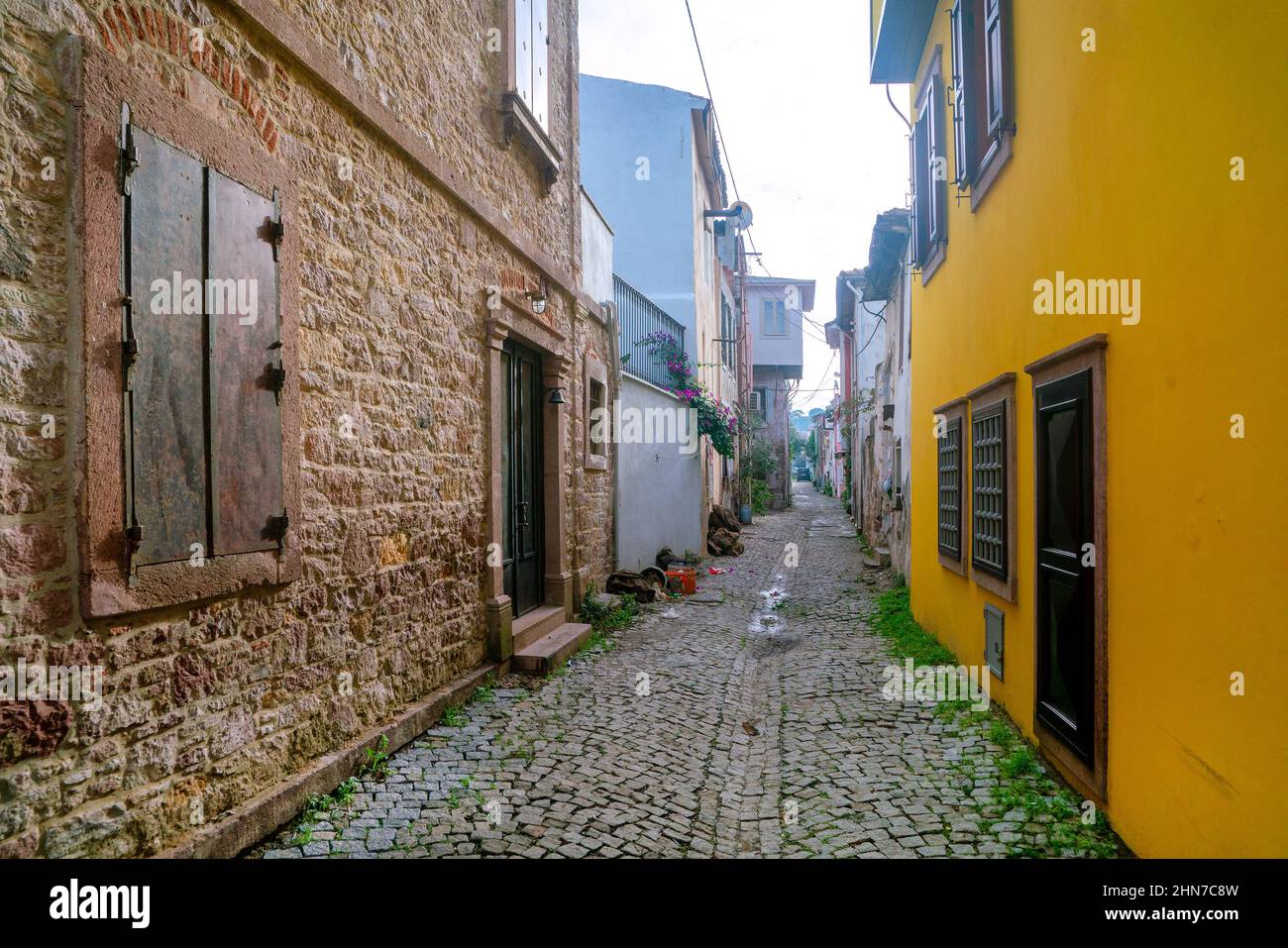 Ancient narrow street in europe. A path made of stone. Ancient houses ...
