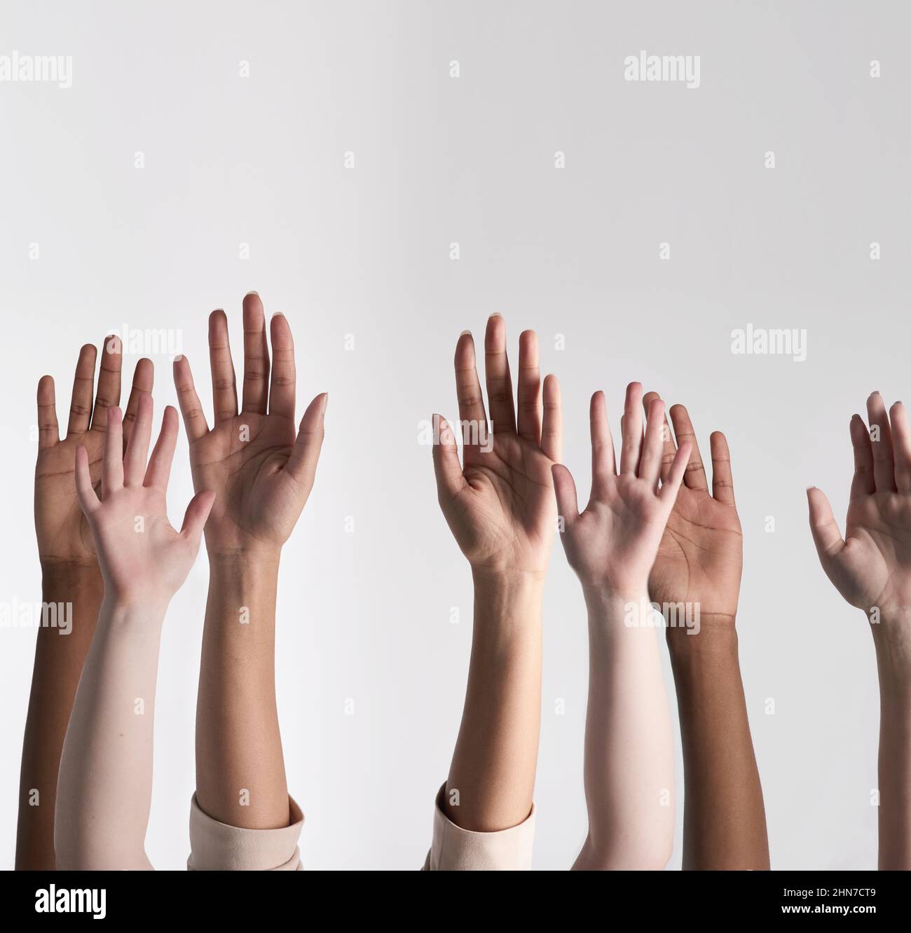 Making their voices heard. Shot of a diverse group of unidentifiable ...