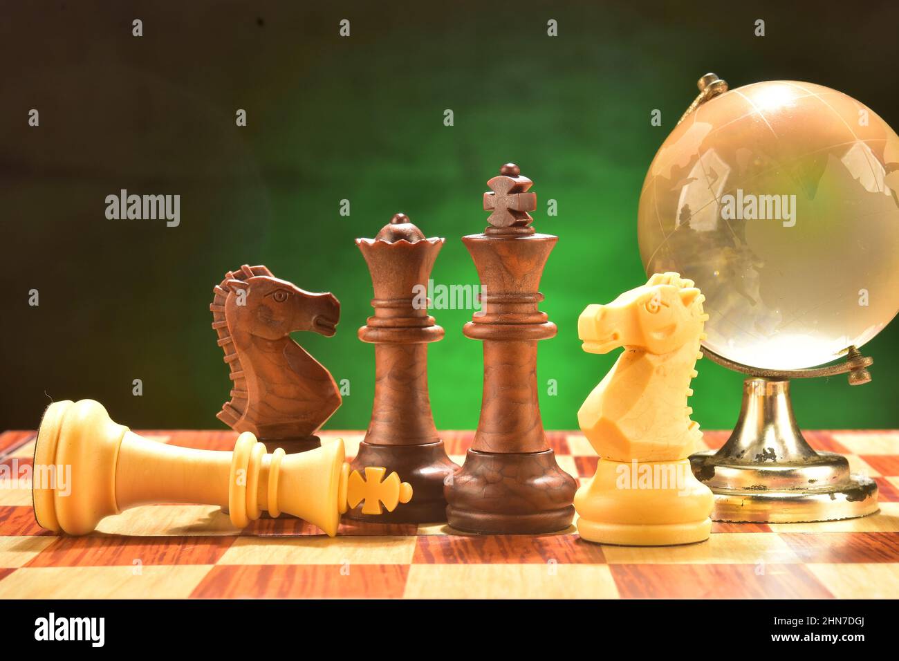 Pieces of chess on the chessboard Stock Photo - Alamy