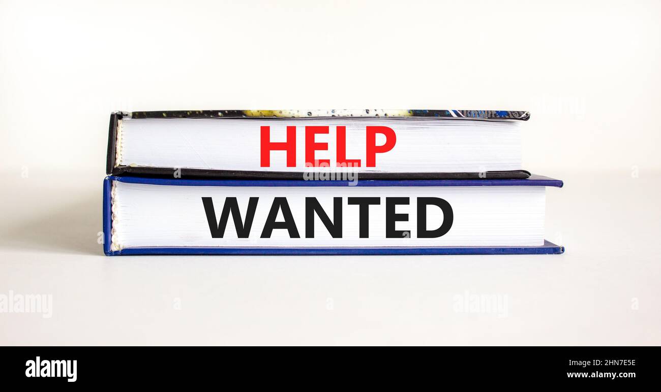 Help wanted and support symbol. Concept words Help wanted on books on a ...