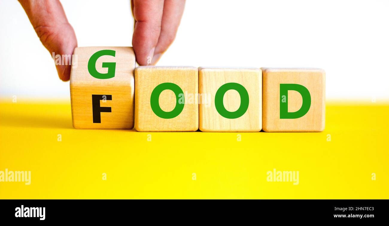 Good food symbol. Doctor turns a wooden cube and changes the word Food ...