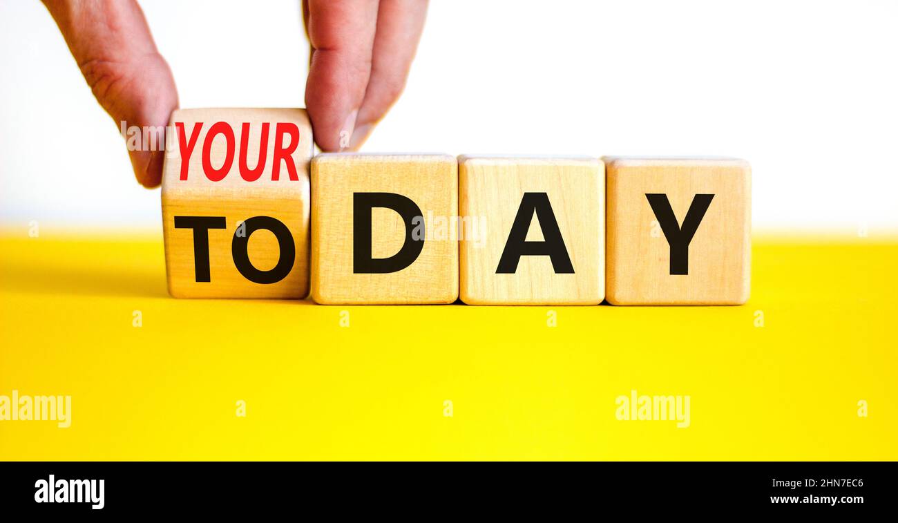 Today is your day symbol. Businessman turns the wooden cube and changes ...