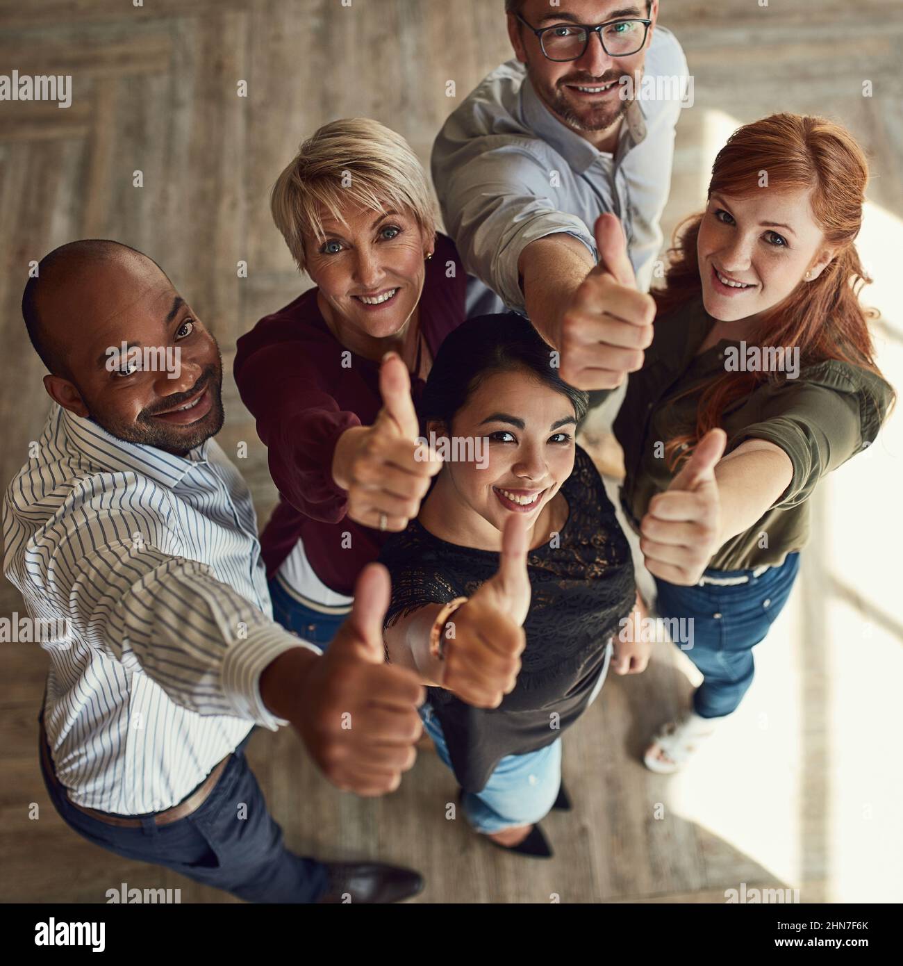 Your success is reaching new heights. High angle portrait of a team of ...
