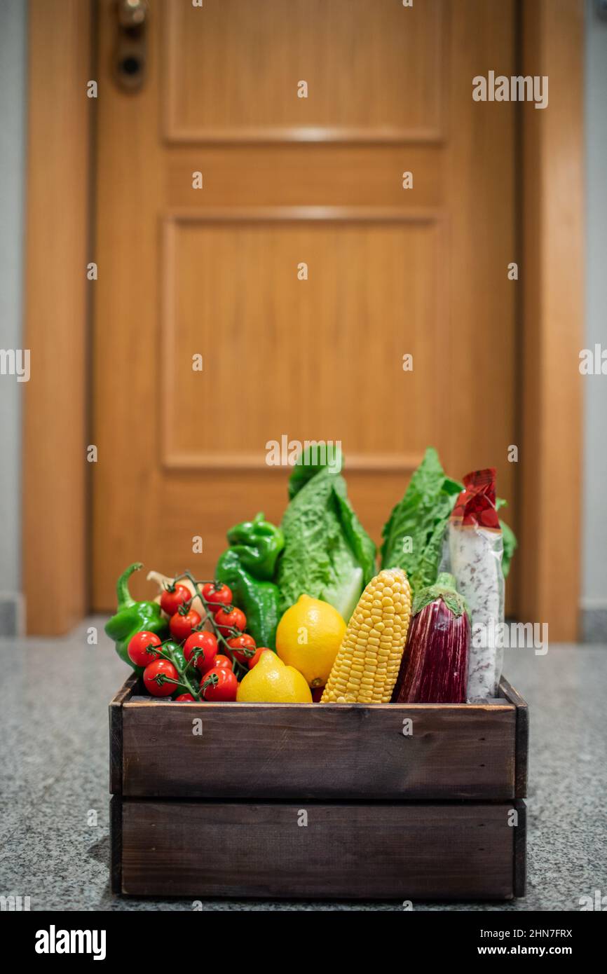 Food shopping box stand at the door of the house or apartment ...