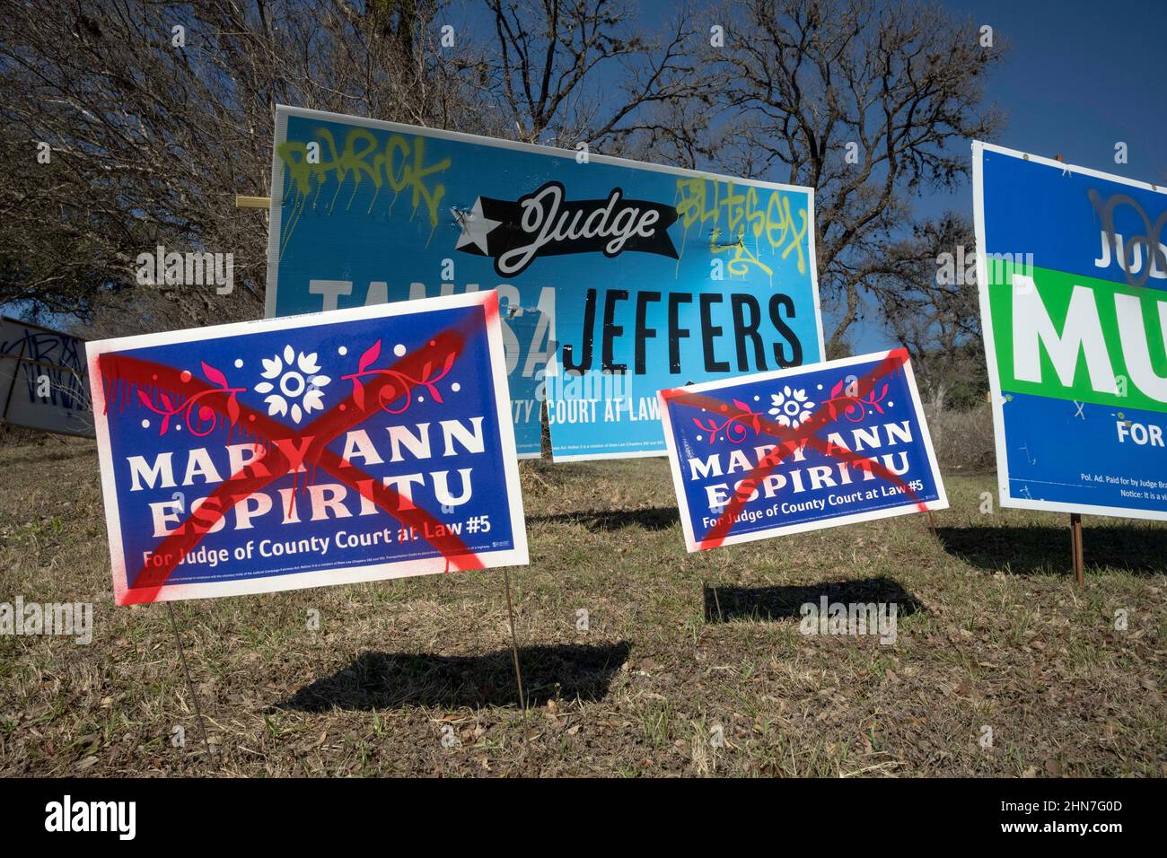 Austin, Texas, USA. 14th Feb, 2022. Vandalized signs litter the corner ...