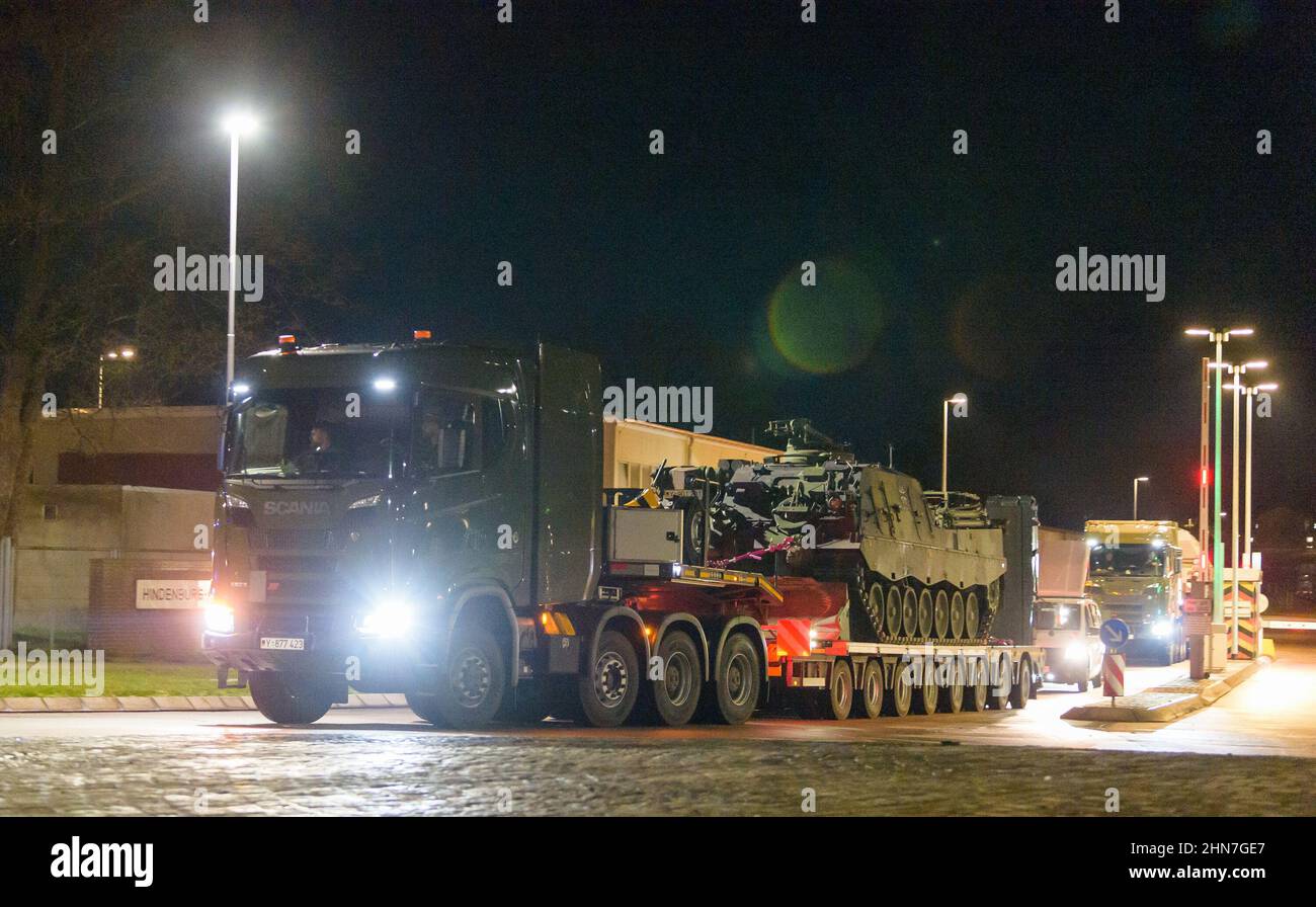 Munster, Germany. 14th Feb, 2022. A Bundeswehr low-loader leaves the ...