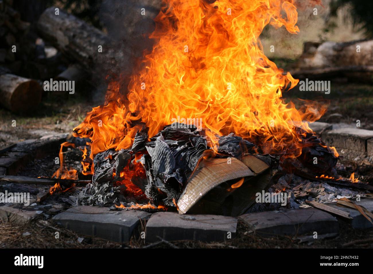 Raging Bonfire in a Fire Pit Stock Photo - Alamy