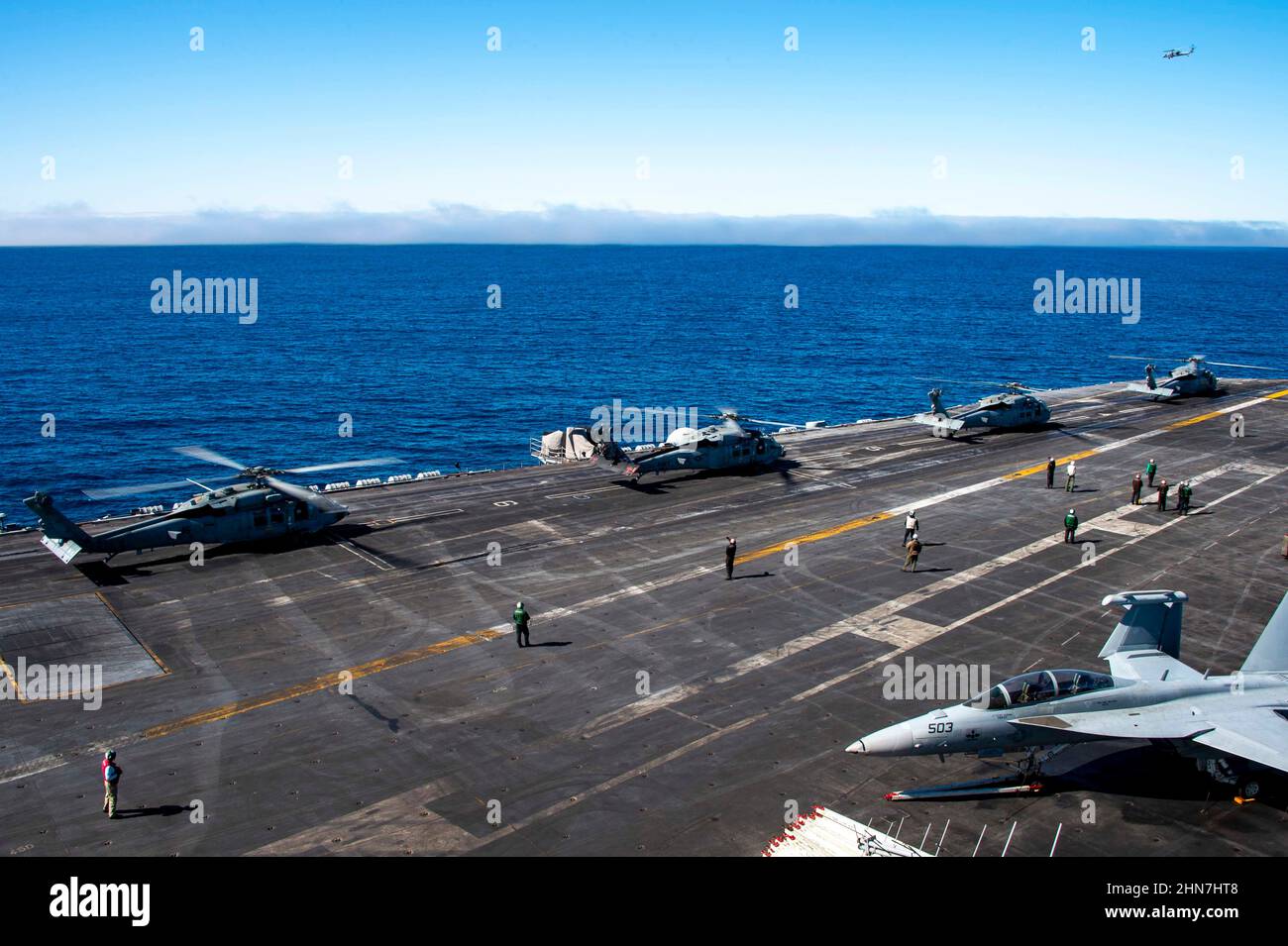 220213-N-MD461-1078 PACIFIC OCEAN (Feb. 13, 2022) Four MH-60S Sea Hawks ...