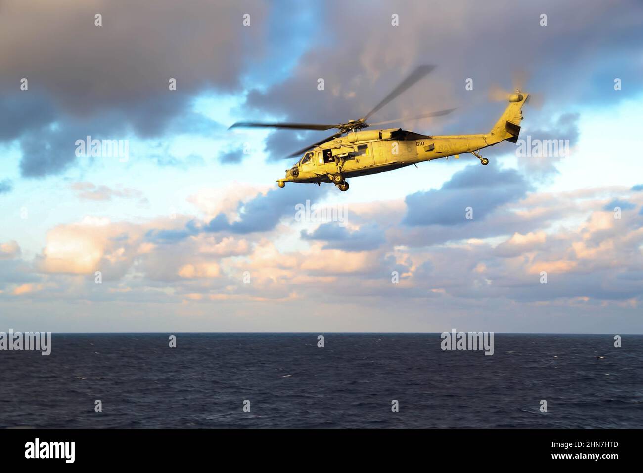 PHILIPPINE SEA (Feb. 12, 2022) An MH-60R Sea hawk helicopter, assigned ...