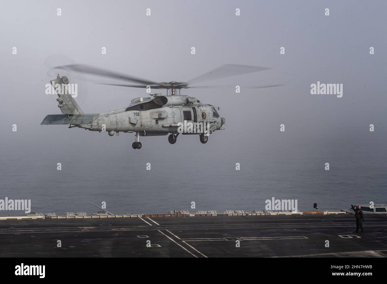 220213-N-YN807-1113 PACIFIC OCEAN (Feb. 13, 2022) An MH-60R Sea Hawk ...