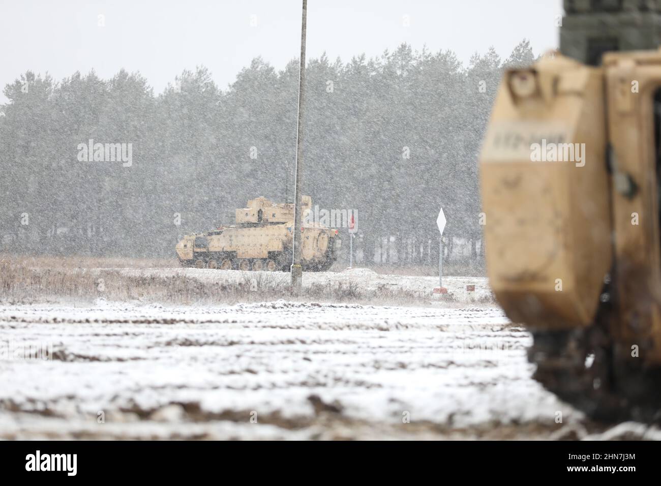 A Bradley Fighting Vehicle (BFV) crew of Charlie Company “Fighting Aces ...