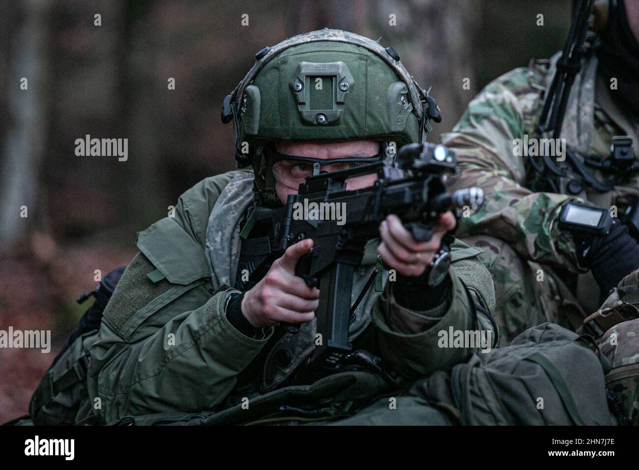 A Lithuanian National Volunteer Defence Force (KASP) soldier pulls ...