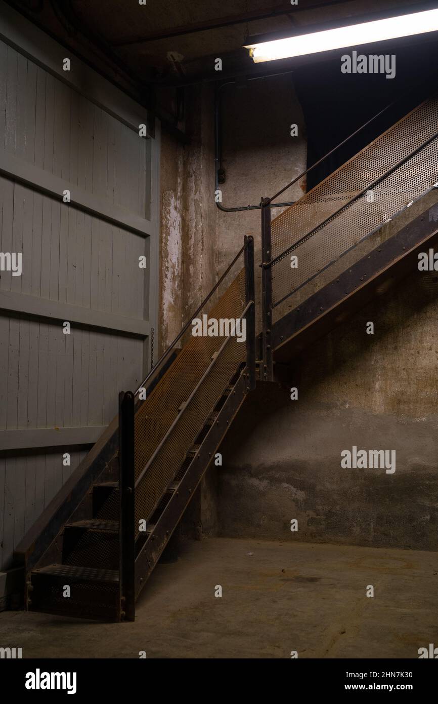 Metallic staircase in an abandoned factory Stock Photo - Alamy