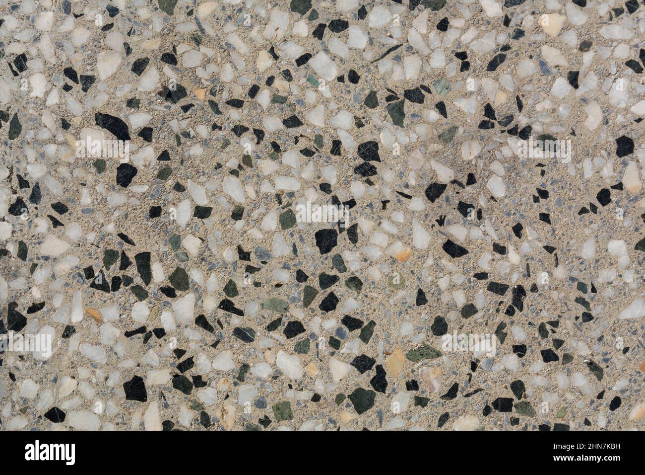 Floor tiles decorated with polished gravel. Background and texture ...