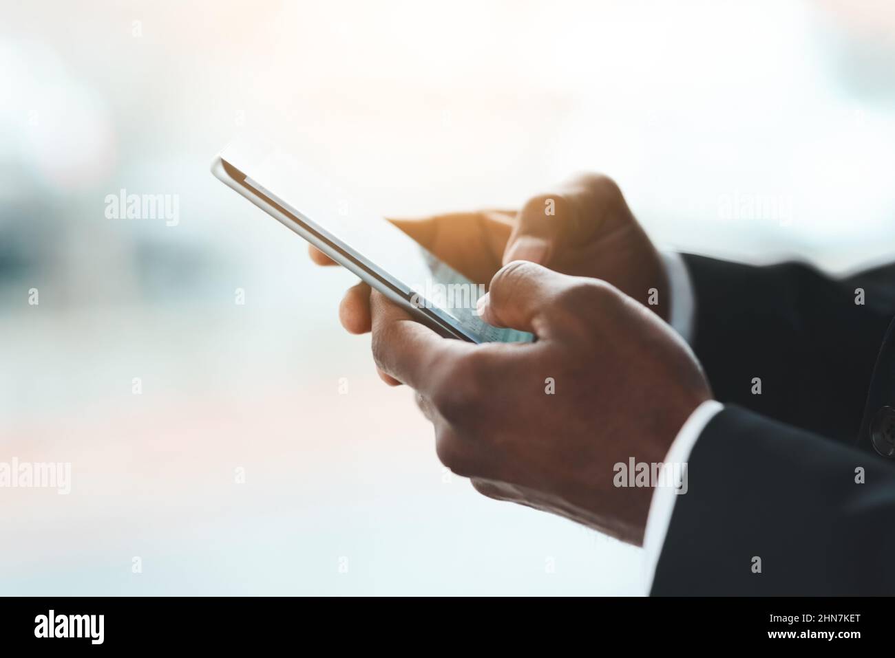 Hand reaching for phone hi-res stock photography and images - Alamy