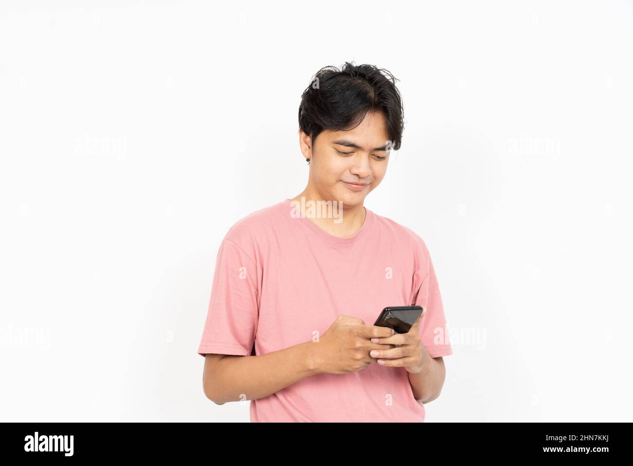 Happy Asian man use smartphone isolated on white background Stock Photo ...