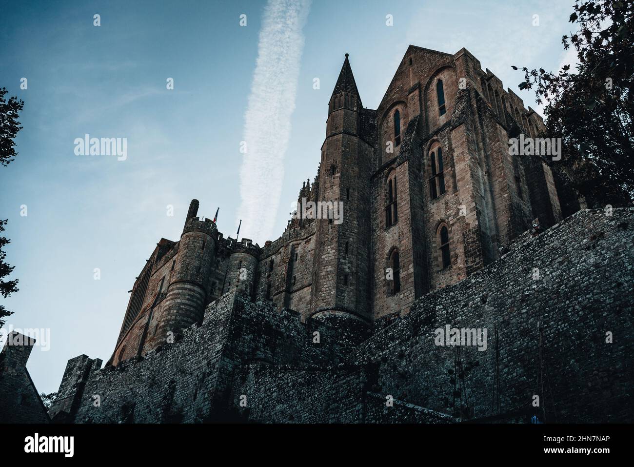 Beautiful view of the Mont Saint Michel Abbey against a clear blue sky ...
