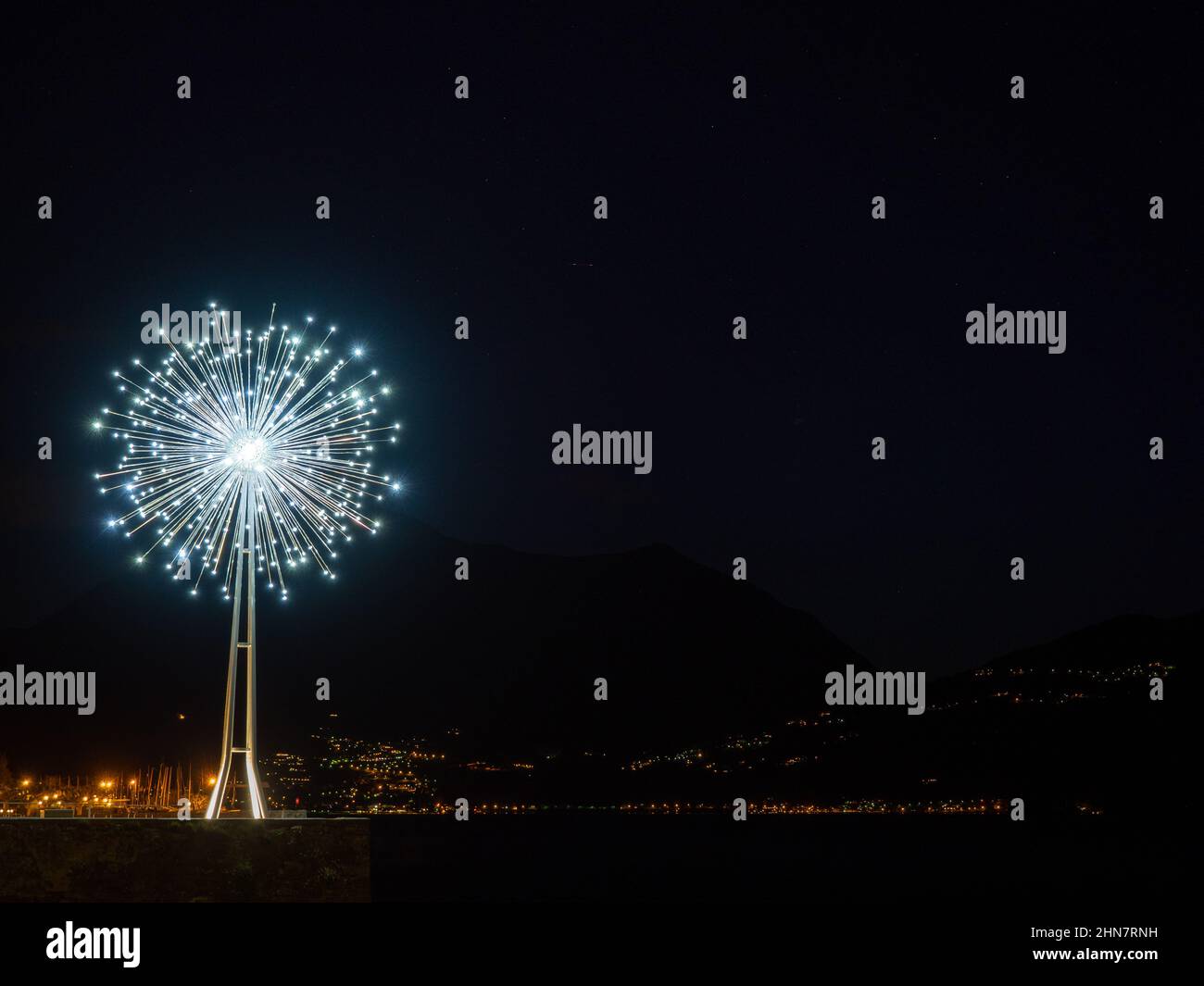 View of a tower with lights in a city at night Stock Photo - Alamy
