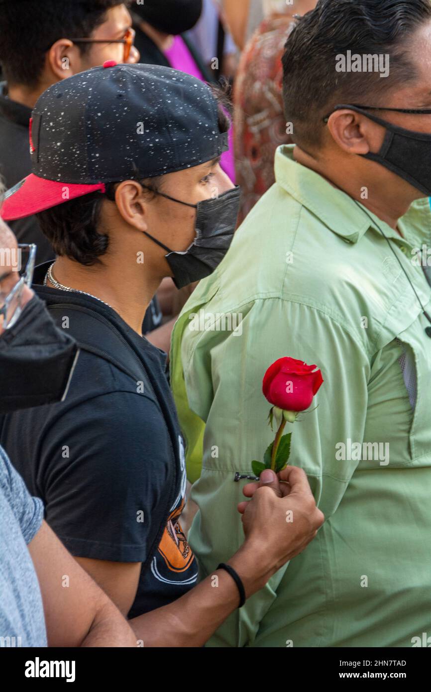 Caracas, Miranda, Venezuela. 14th Feb, 2022. A young man with a red ...