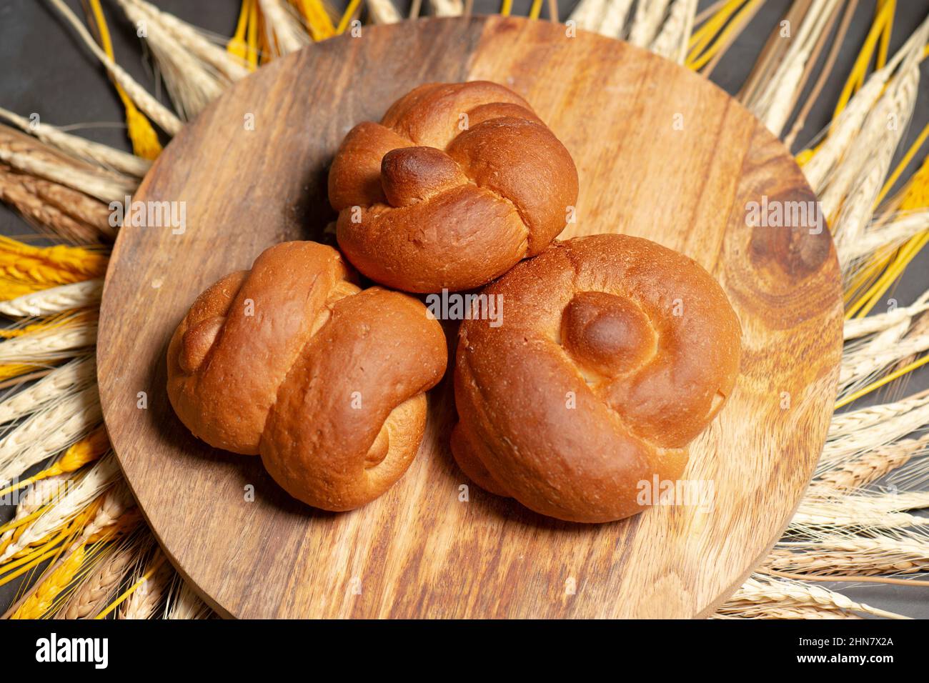 Delicious fresh baked crusty style knot bread rolls in assorted shapes ...