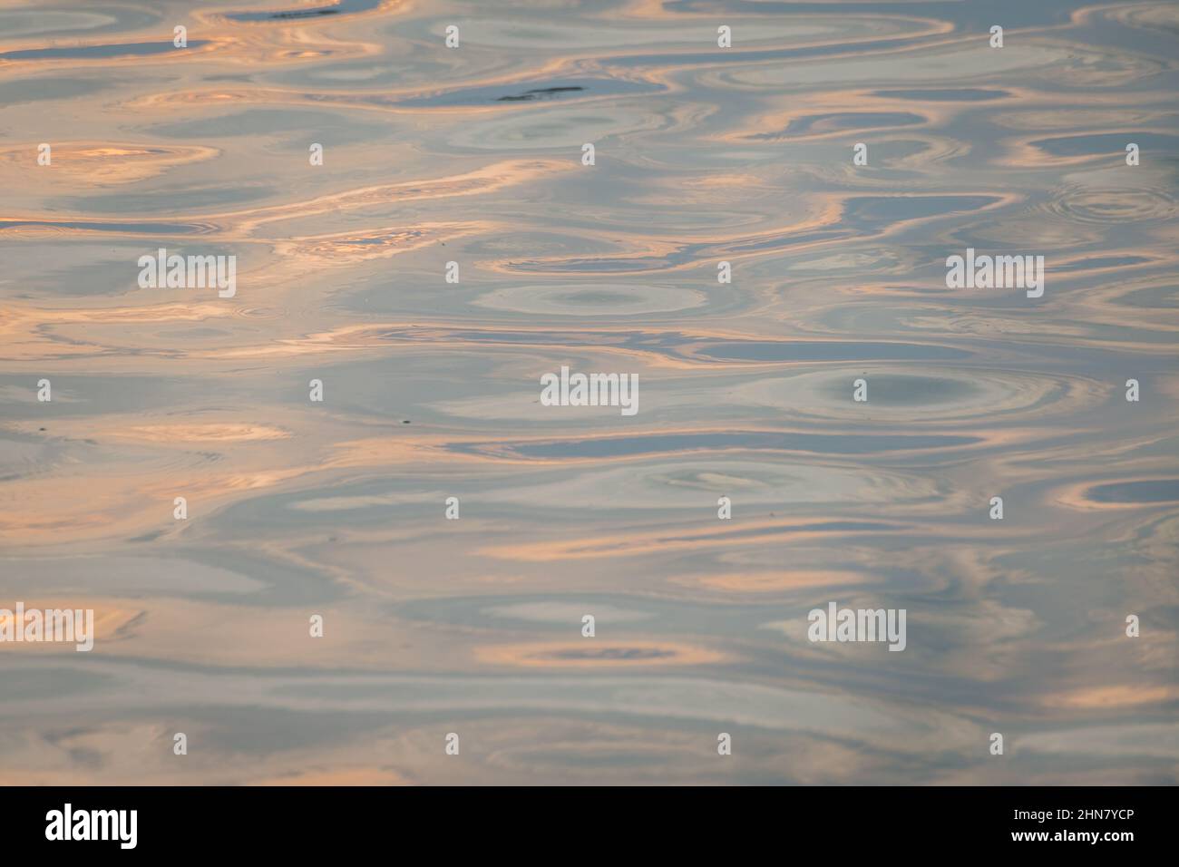 beautiful water wave pattern sunset and reflections background Stock ...