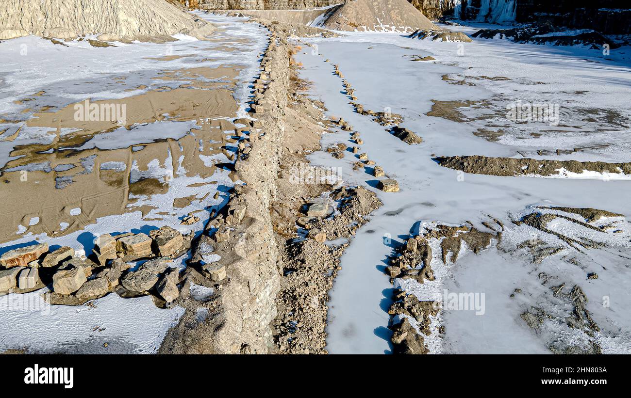 Snow covered rock quarry Stock Photo - Alamy