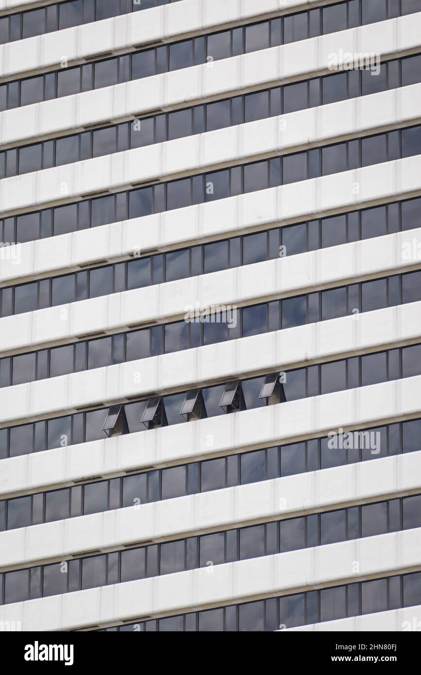 Windows of office building for background Stock Photo - Alamy