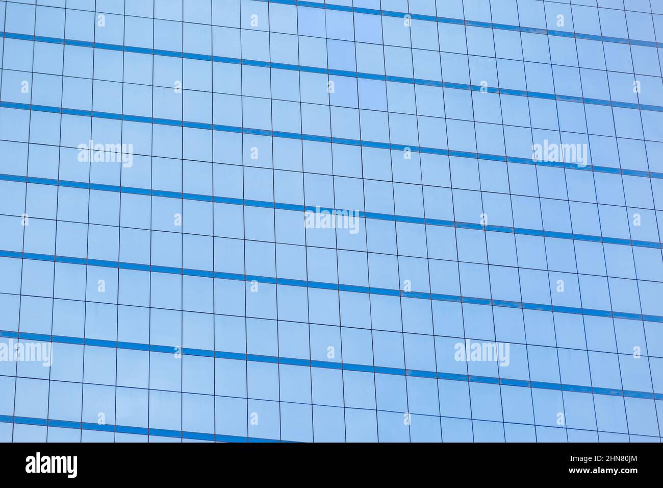 Blue glass windows of office building for background Stock Photo - Alamy