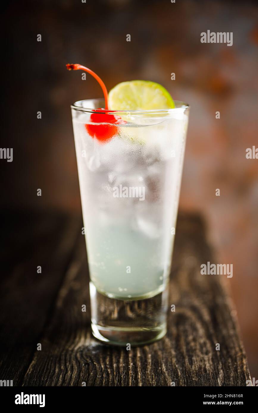 Rum collins cocktail (variation of traditional Tom collins). Selective ...