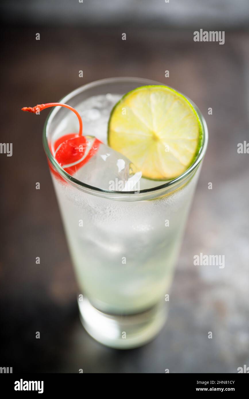 Rum collins cocktail (variation of traditional Tom collins). Selective ...