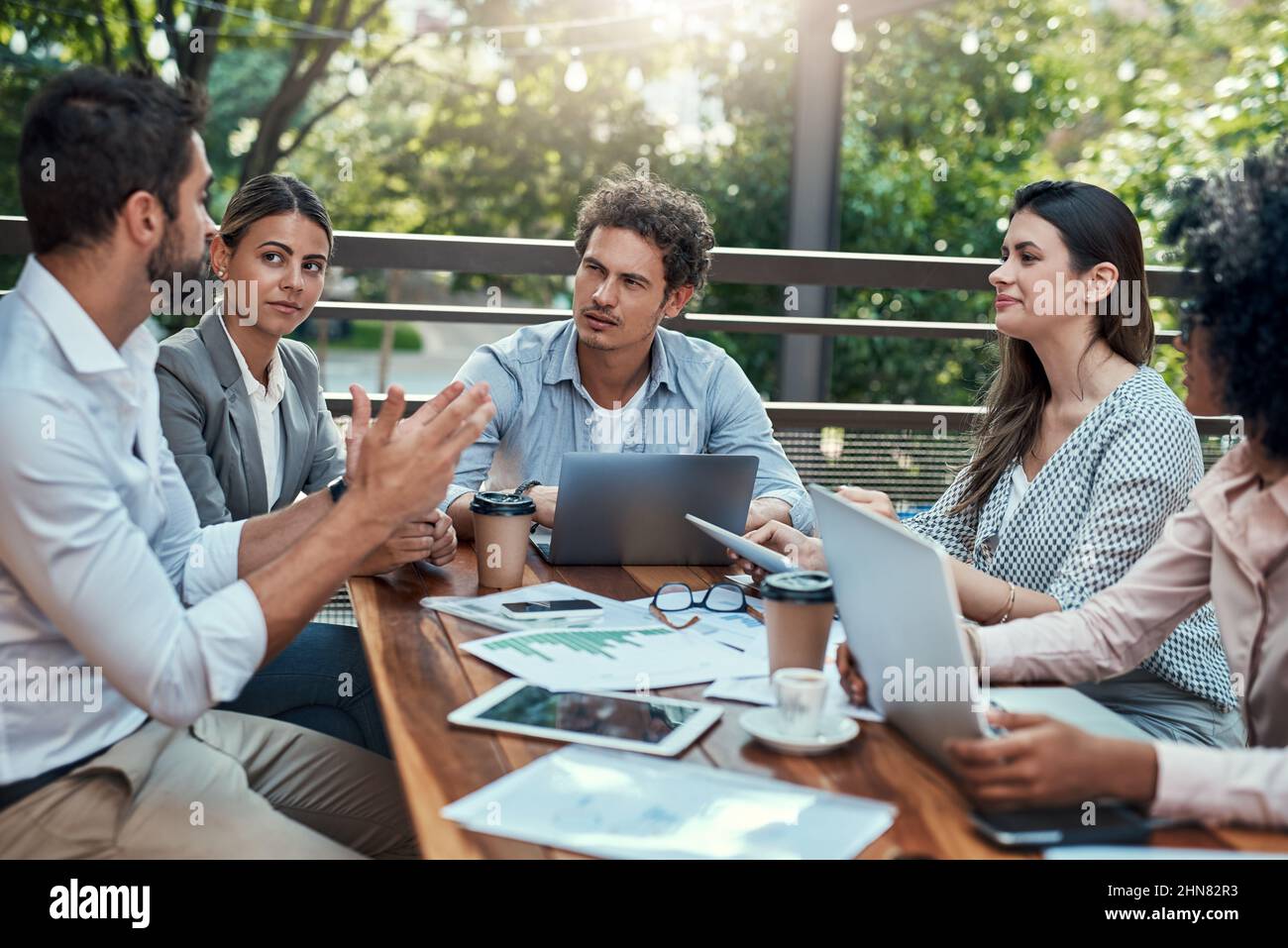 Different venue, different perspectives. Shot of a group of colleagues ...