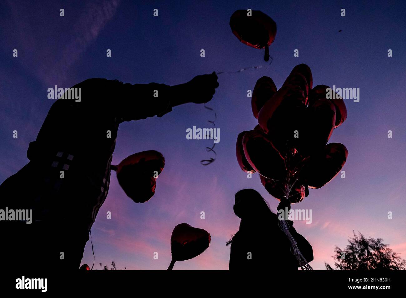 Los Angeles, California, USA. 14th Feb, 2022. People decorate with ...