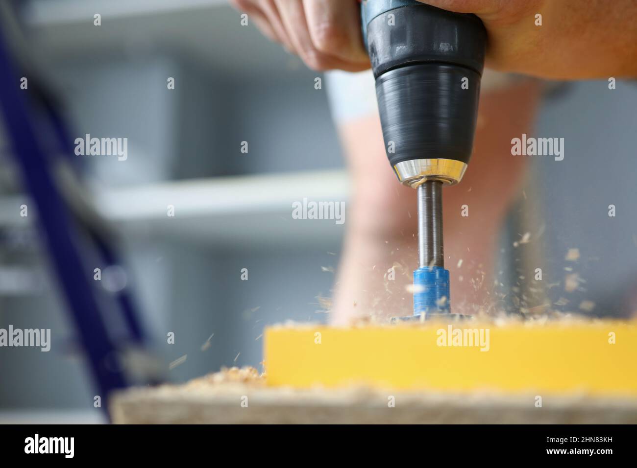 Professional worker using tool Stock Photo - Alamy