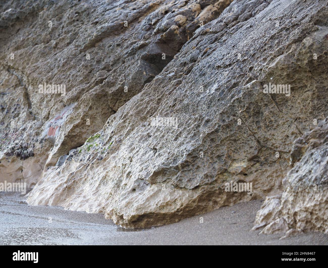 Scenic view of rock formatios on the beach Stock Photo - Alamy
