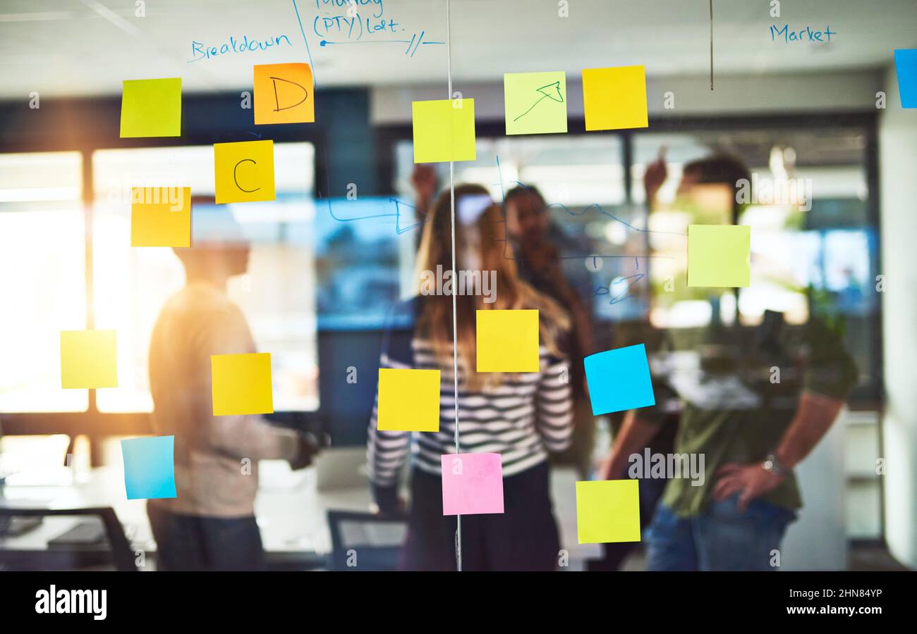 Creative thinkers in their natural habitat. Shot of colleagues having a ...