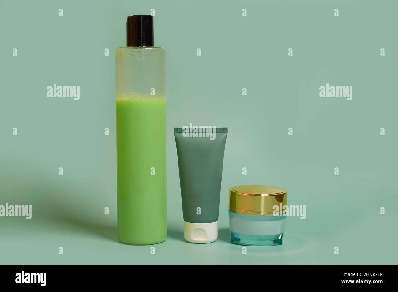 A tube of hand cream and jars of hand and face cream Stock Photo - Alamy