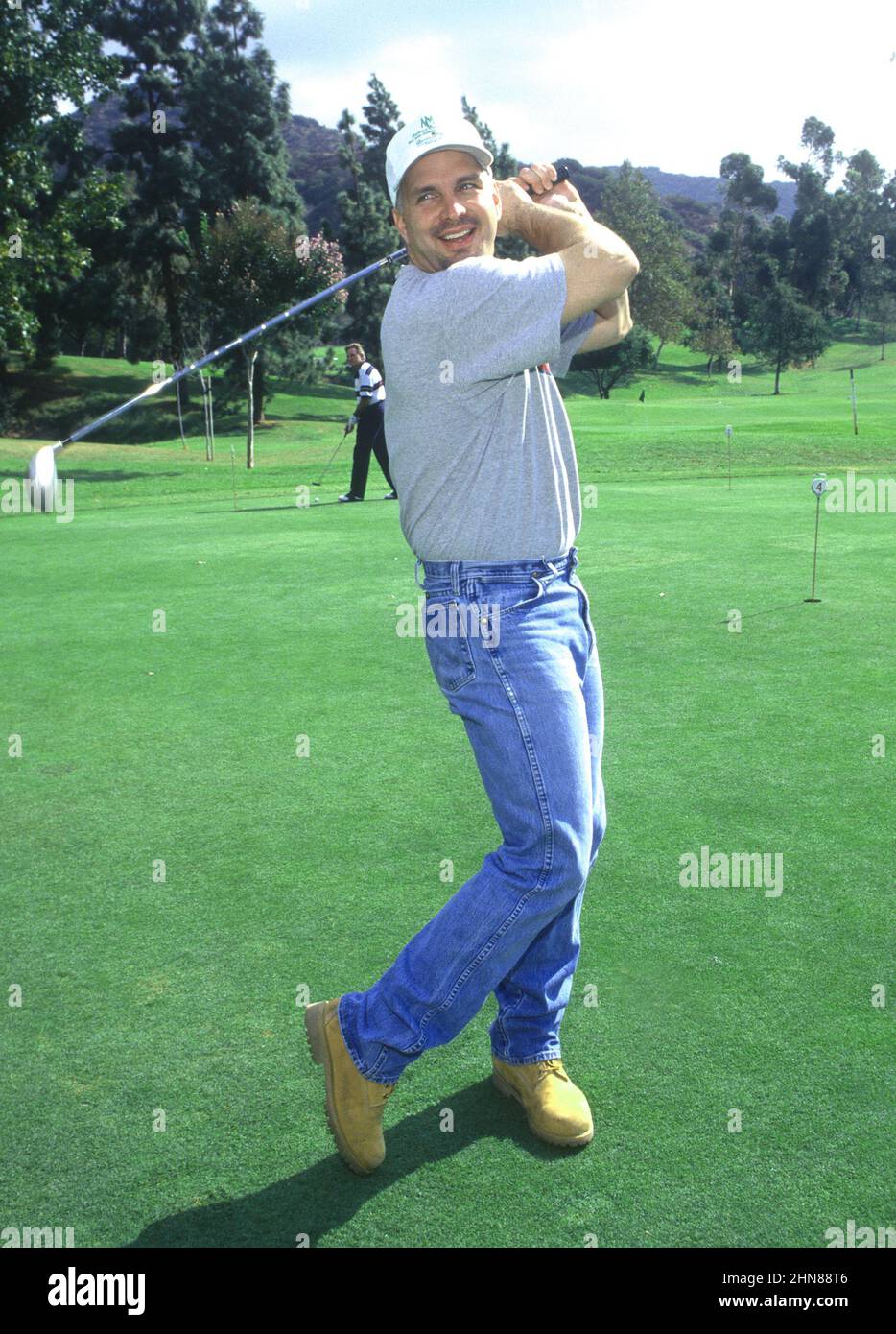 Garth Brooks photographed in 1997 Credit: Ron Wolfson / Rock Negatives ...