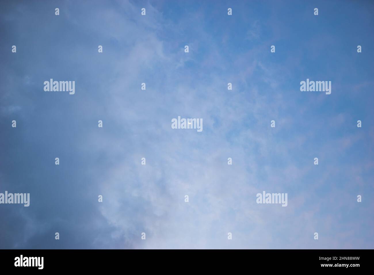 Blue sky with light clouds and moon. Beautiful sky. Scenic view in ...