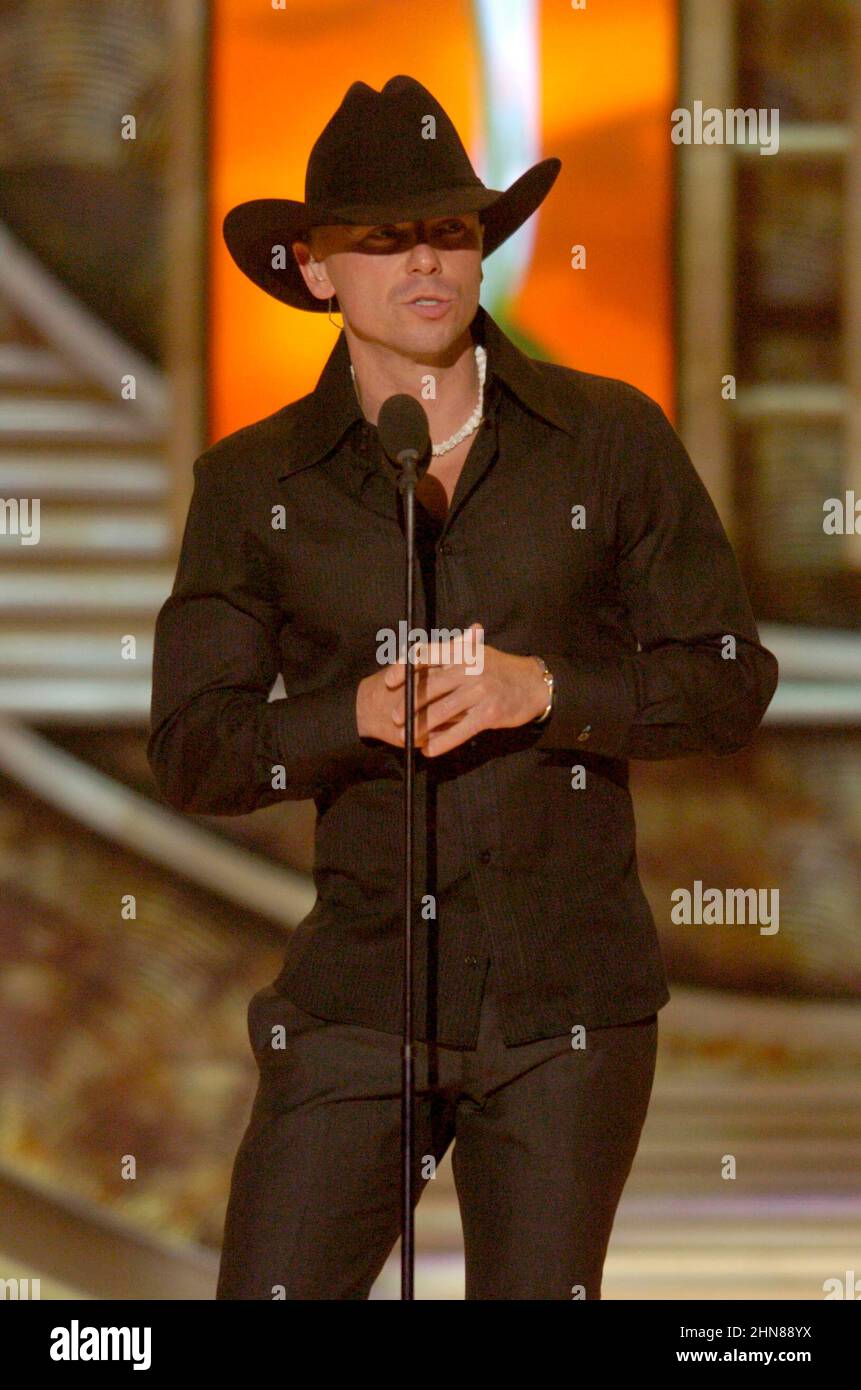 Kenny Chesney performing in 2005 Credit: Ron Wolfson / Rock Negatives ...