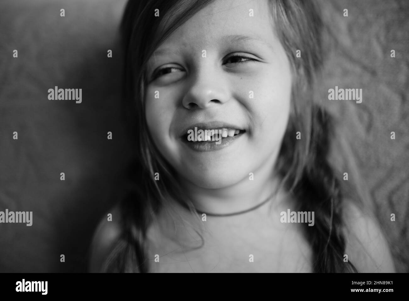 cheerful girl without front teeth Stock Photo - Alamy