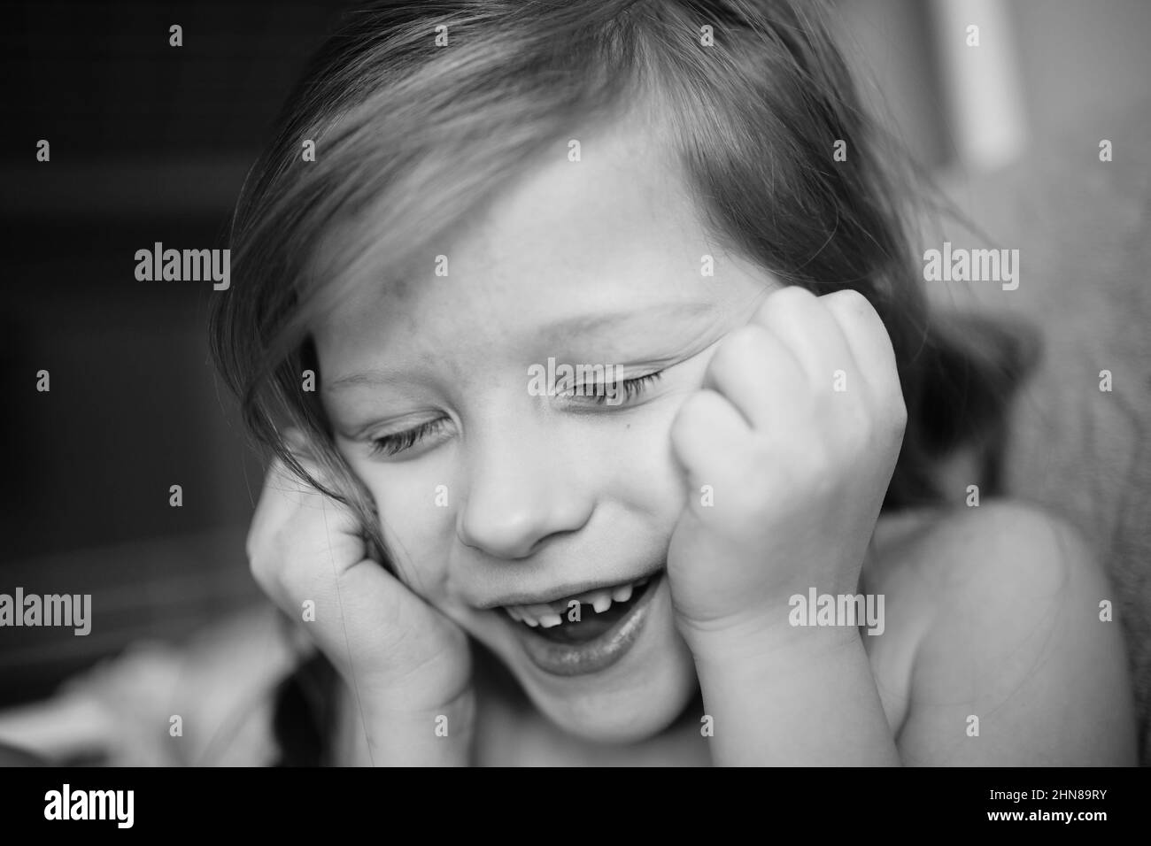 cheerful girl without front teeth Stock Photo - Alamy
