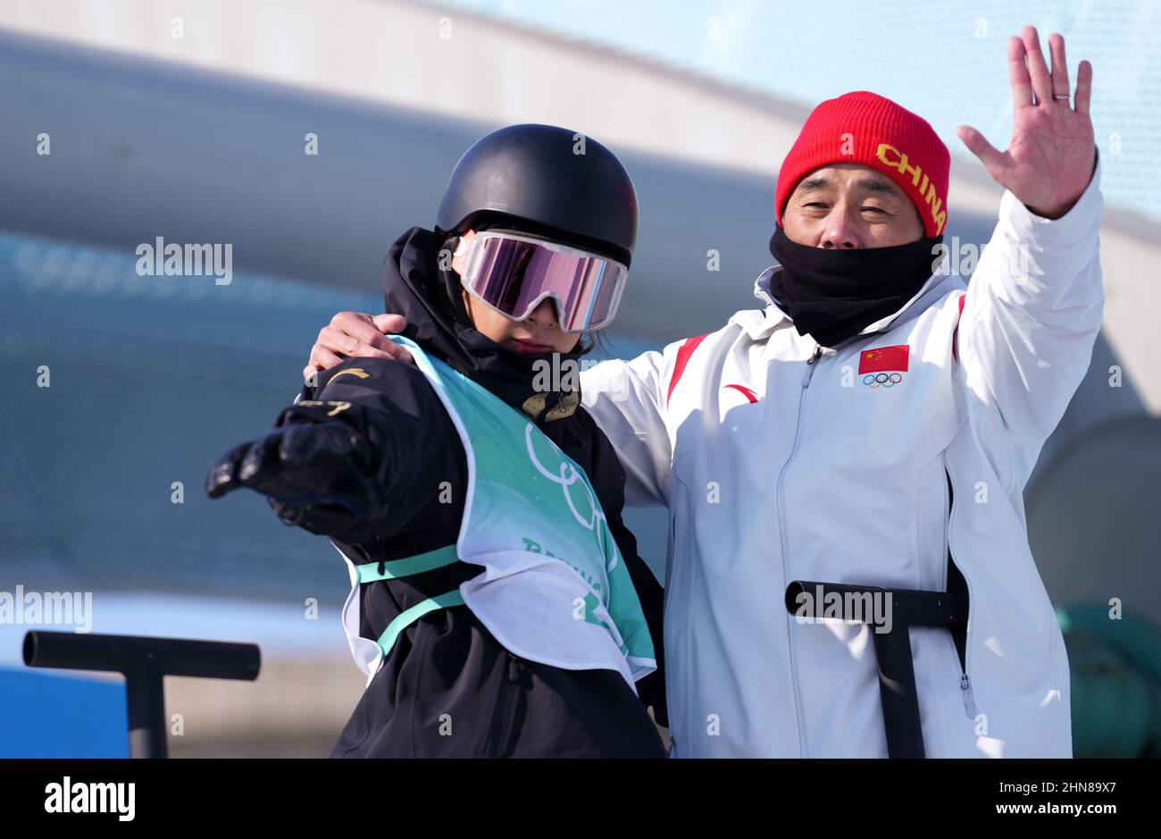 Beijing, China. 15th Feb, 2022. Su Yiming (L) of China and his coach ...