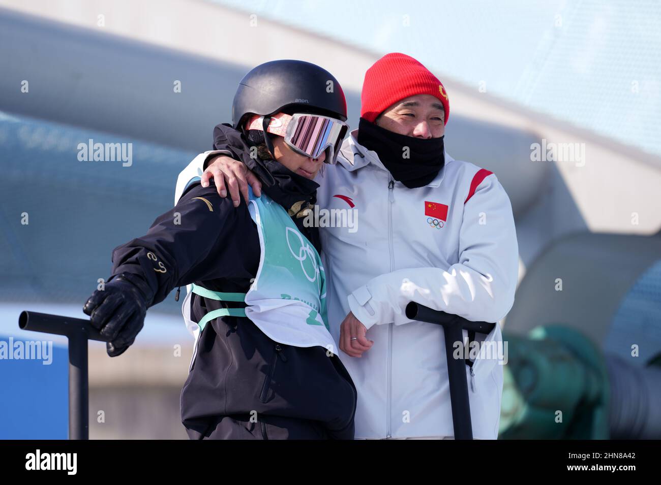 Beijing, China. 15th Feb, 2022. Su Yiming (L) of China and his coach ...