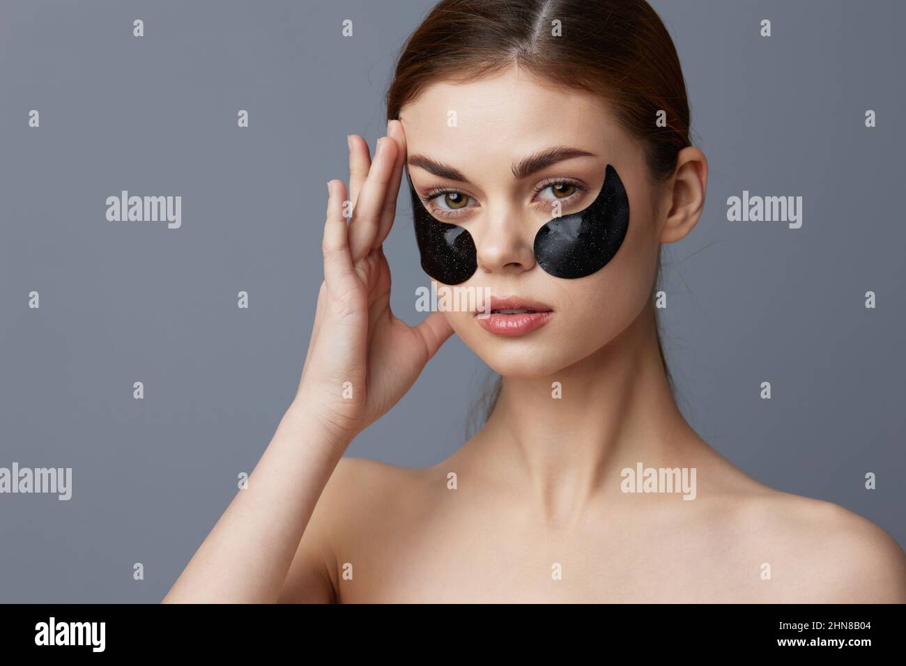 pretty woman with patches on the face clean skin health rejuvenation ...