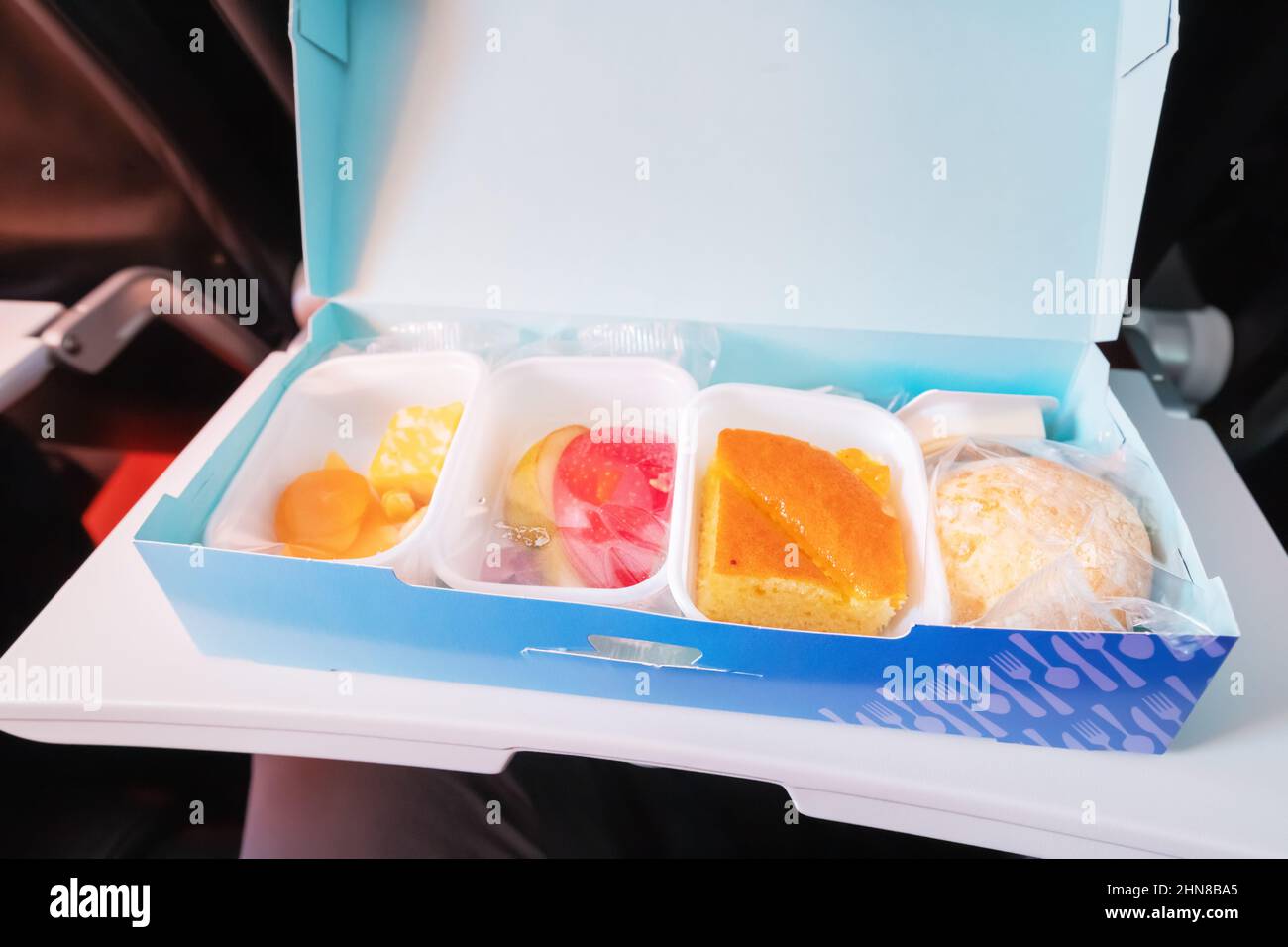 Lunch box with a light and healthy breakfast during the flight on board ...