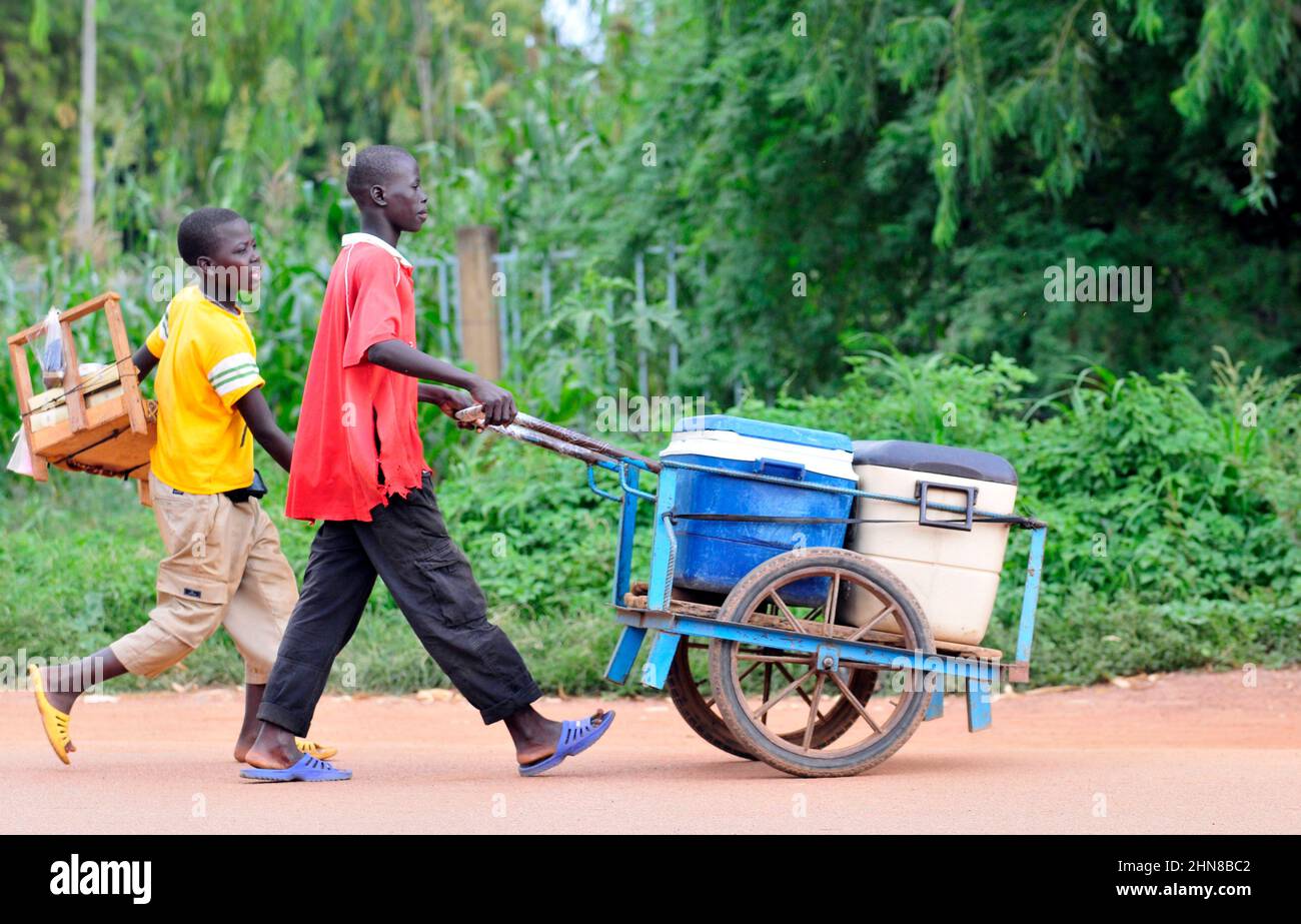 Boys Pushing Cart High Resolution Stock Photography and Images - Alamy