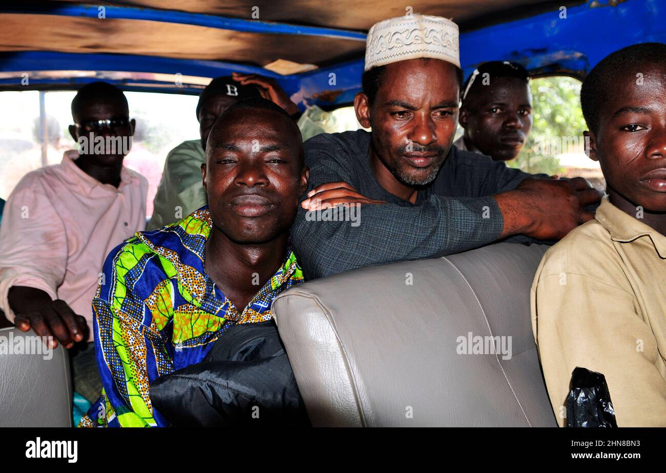 Passengers inside a Bush Taxi heading to Benin from Burkina Faso Stock ...